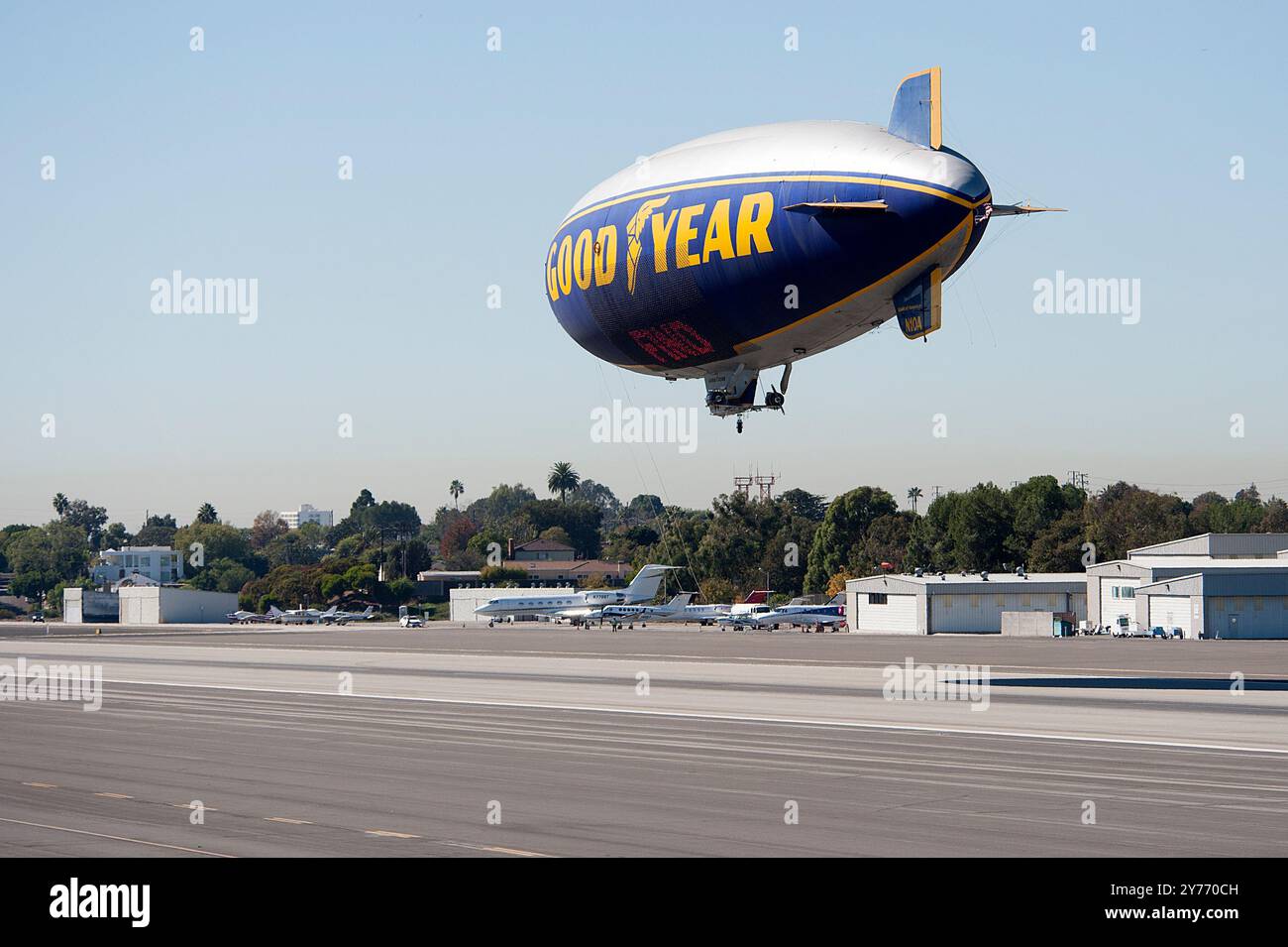 The iconic Goodyear Blimp, a symbol of airship aviation, gracefully ...