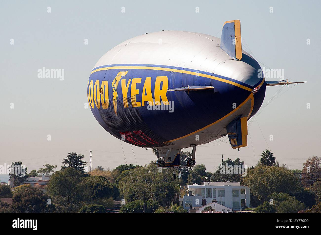 The iconic Goodyear Blimp, a symbol of airship aviation, gracefully ...