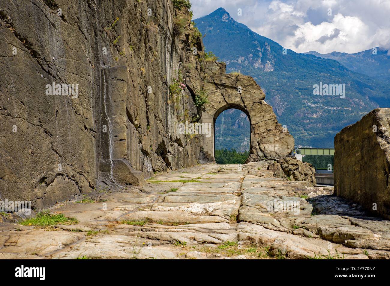 the old roman road with wheel tracks near the village of donnas in the ...
