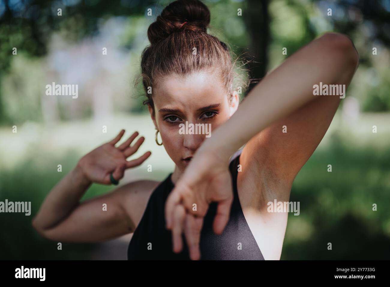 Lovely girl dancing in nature, female dancer performing modern dance with passion outdoors Stock ...