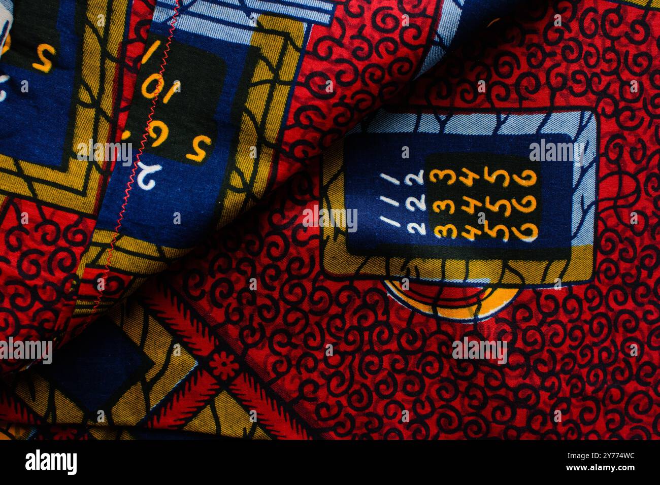 top view of red blue ankara fabric, flatlay of nigerian wax cloth with ...