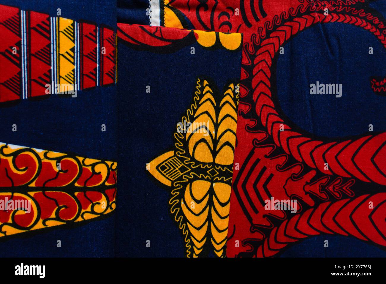 top view of red blue ankara fabric, flatlay of nigerian wax cloth with ...