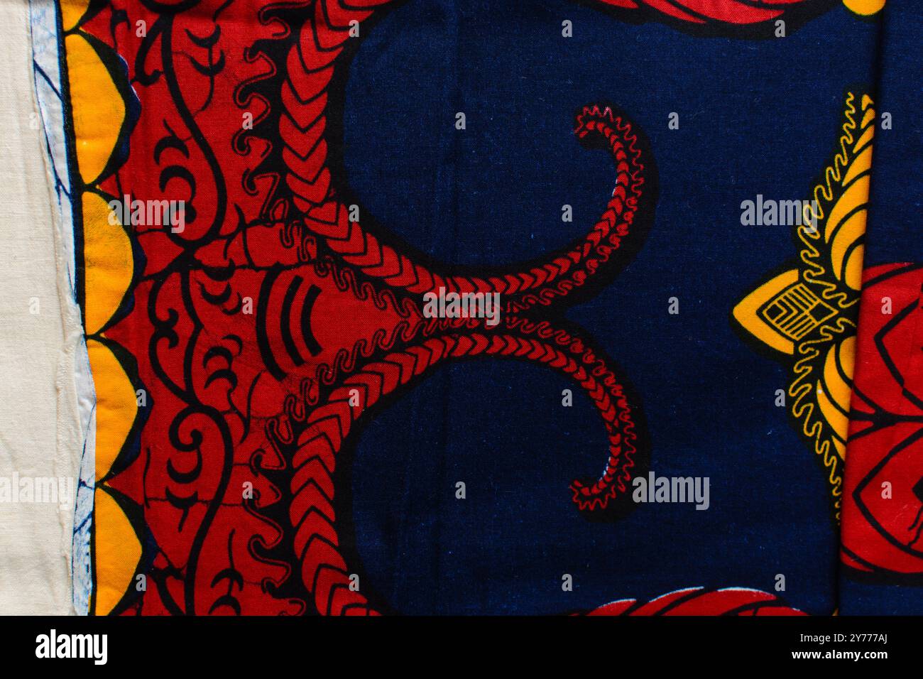 top view of red blue ankara fabric, flatlay of nigerian wax cloth with ...