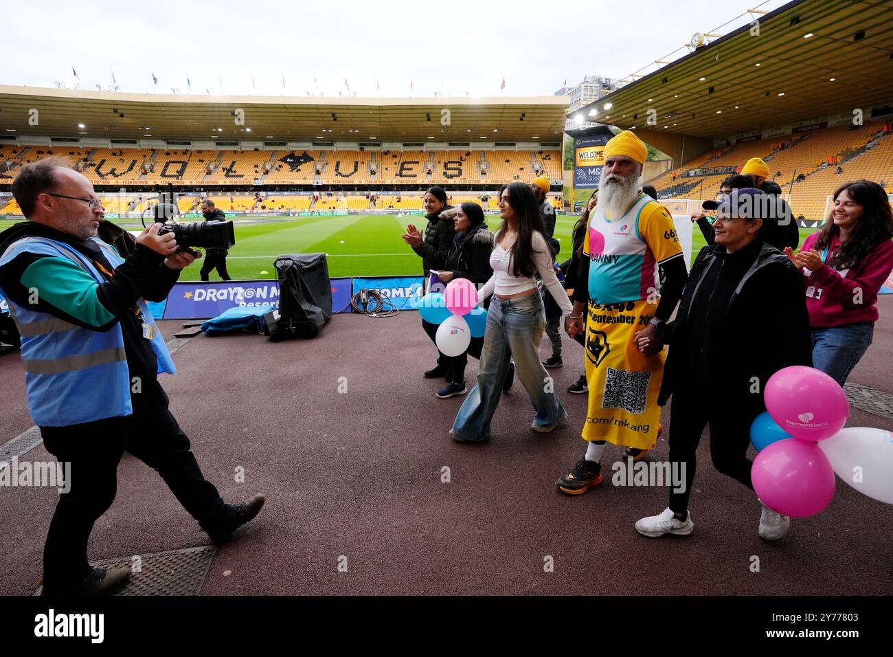 Manny Singh Kang arrives at the finish line after walking for 48 hours ...