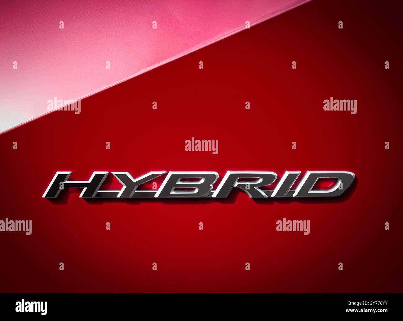 Green Environment Image Of A A Shiny New Red Hybrid Car Stock Photo - Alamy