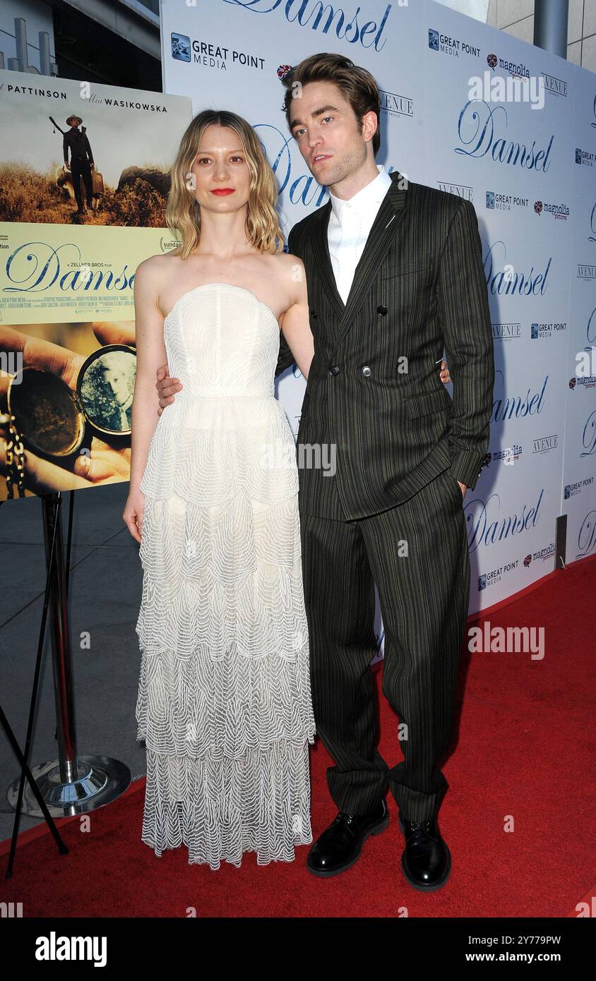 Mia Wasikowska and Robert Pattinson at the Los Angeles premiere of ...