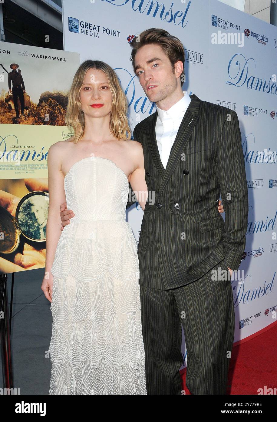 Mia Wasikowska and Robert Pattinson at the Los Angeles premiere of ...