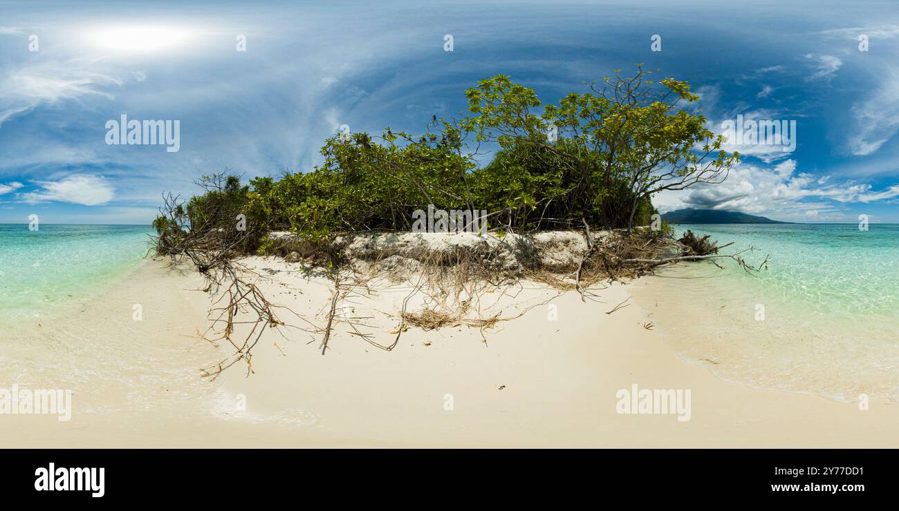 Beach with white sand and clear ocean water and waves. Mantigue Island ...