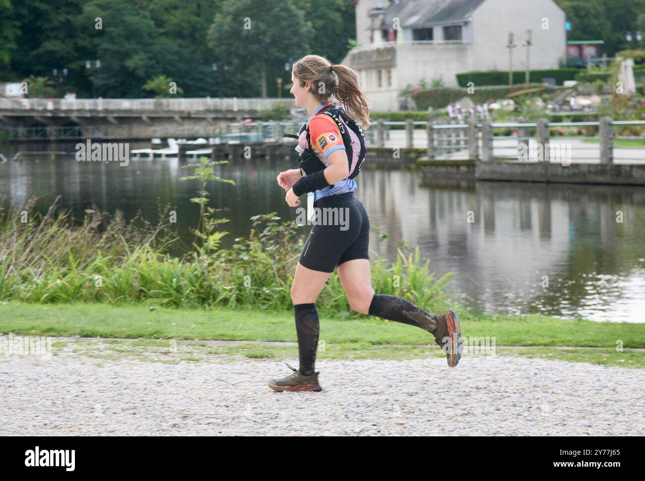 A lady runner at the lakeside, Bagnoles de l'Orne, Normandie, North ...