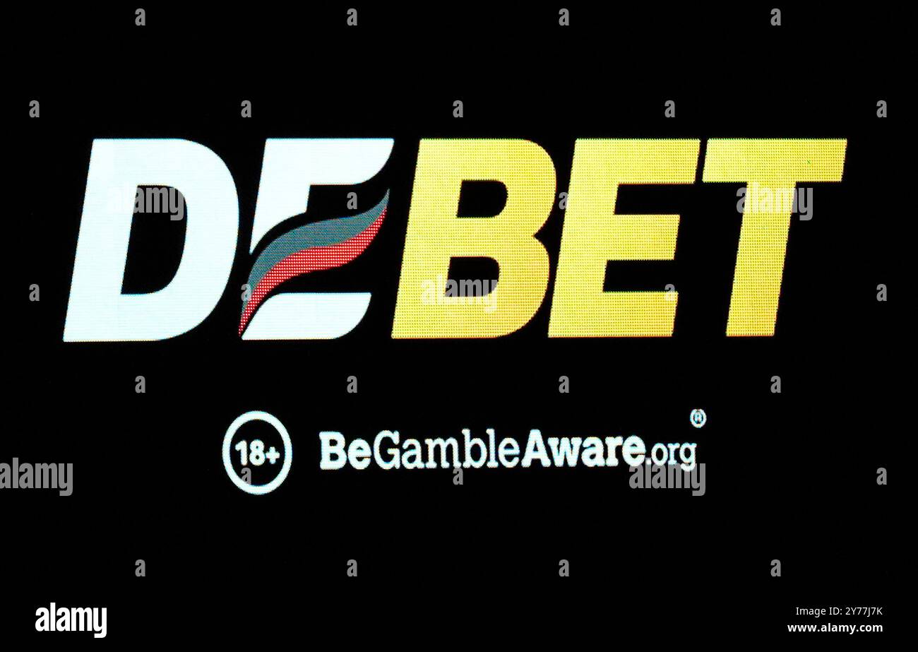 The big screen showing the logo of sponsor DEBET during the Premier ...
