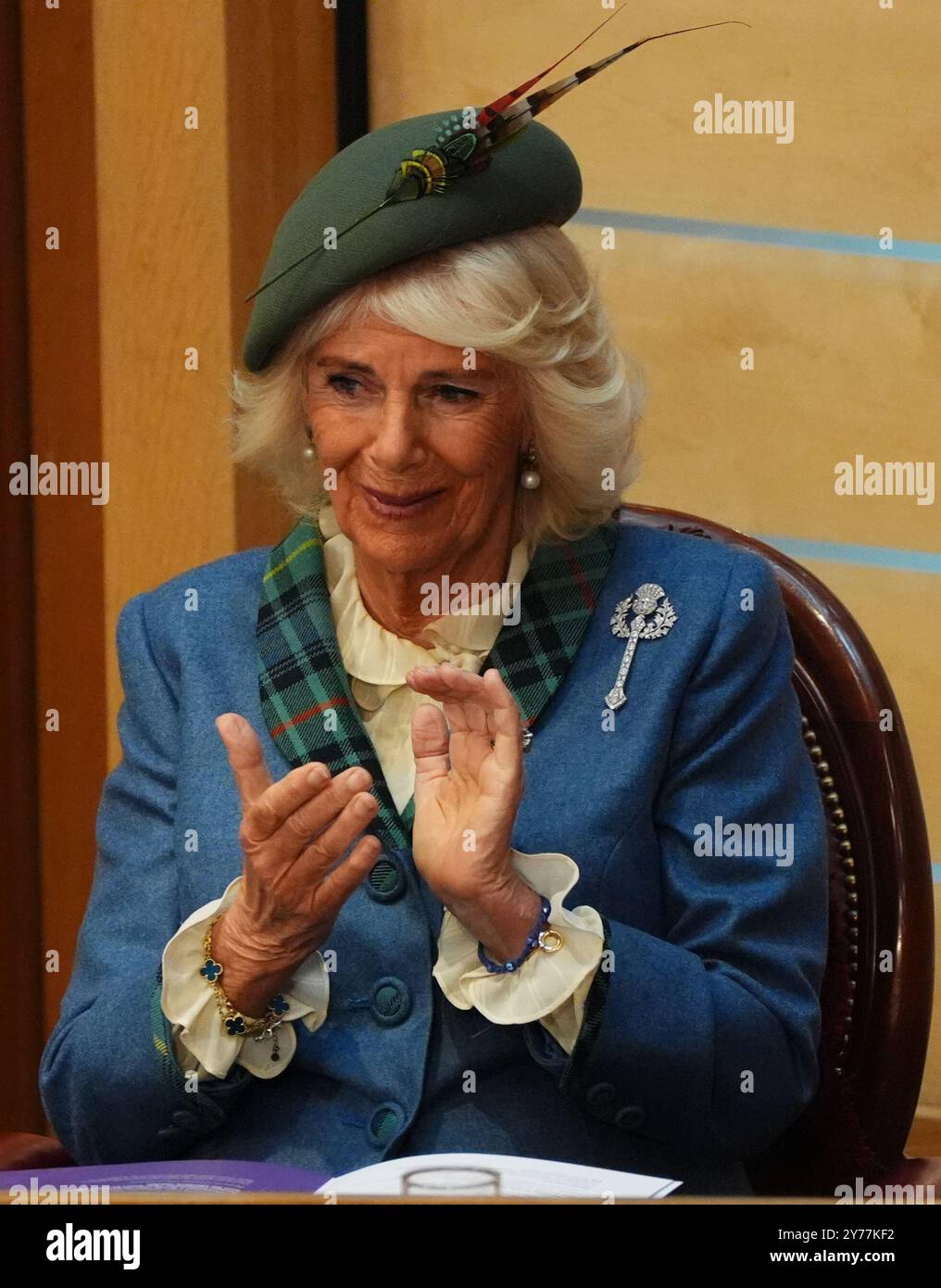 Queen Camilla clapping during a visit to the Scottish Parliament in ...