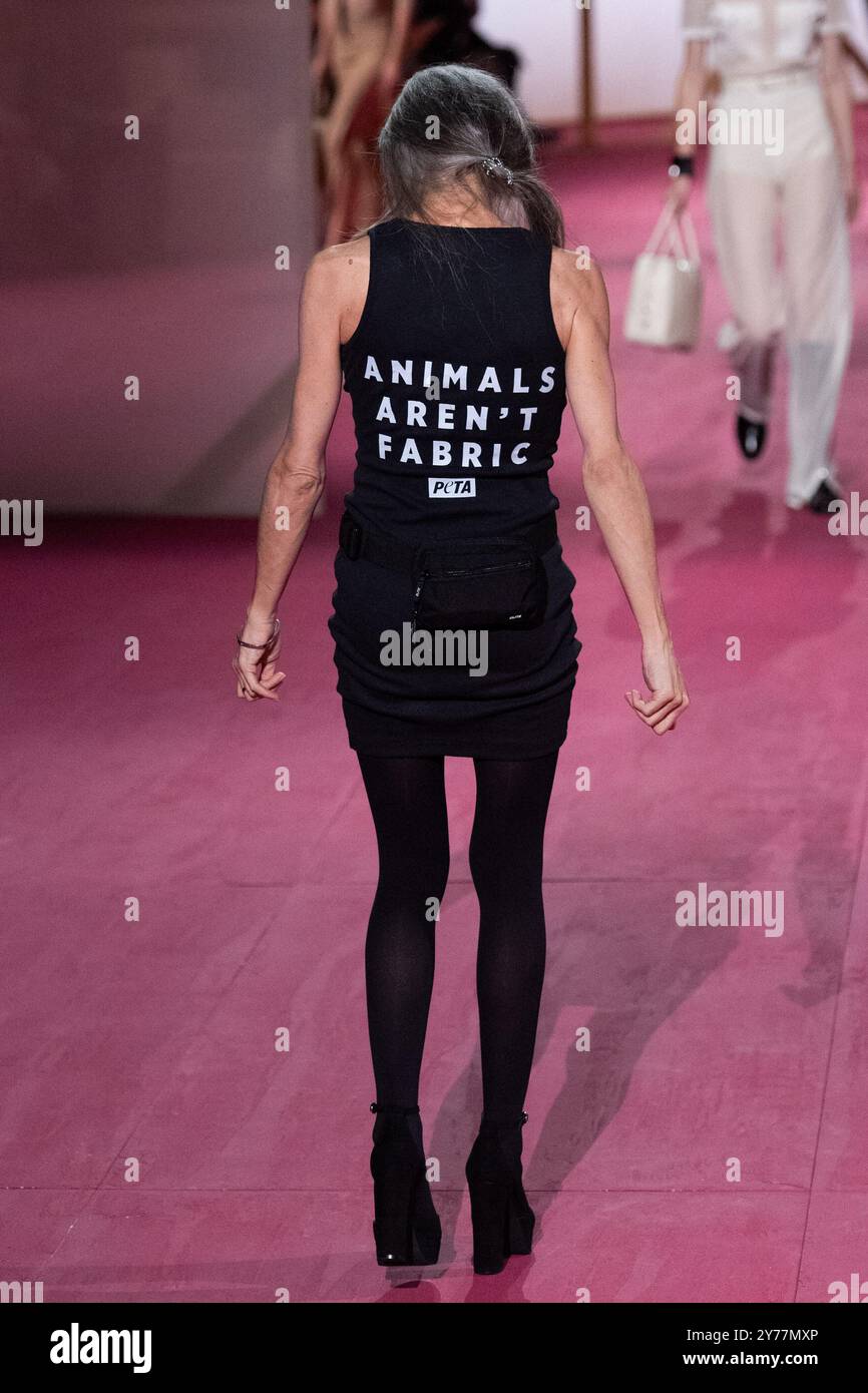 Paris, France. 28th Sep, 2024. Activist from Peta shows a sign against ...