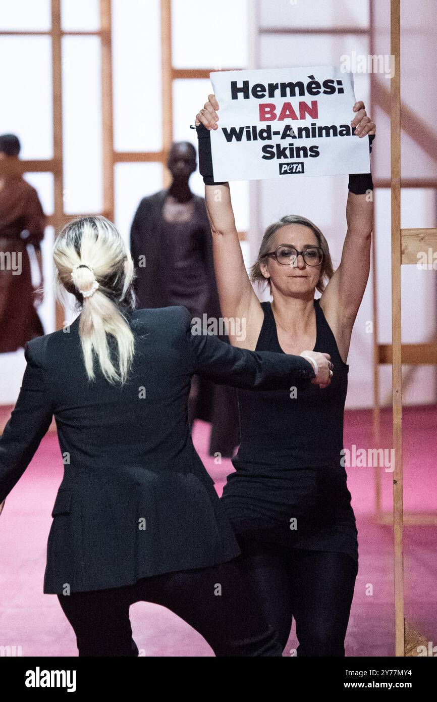 Paris, France. 28th Sep, 2024. Activist from Peta shows a sign against ...