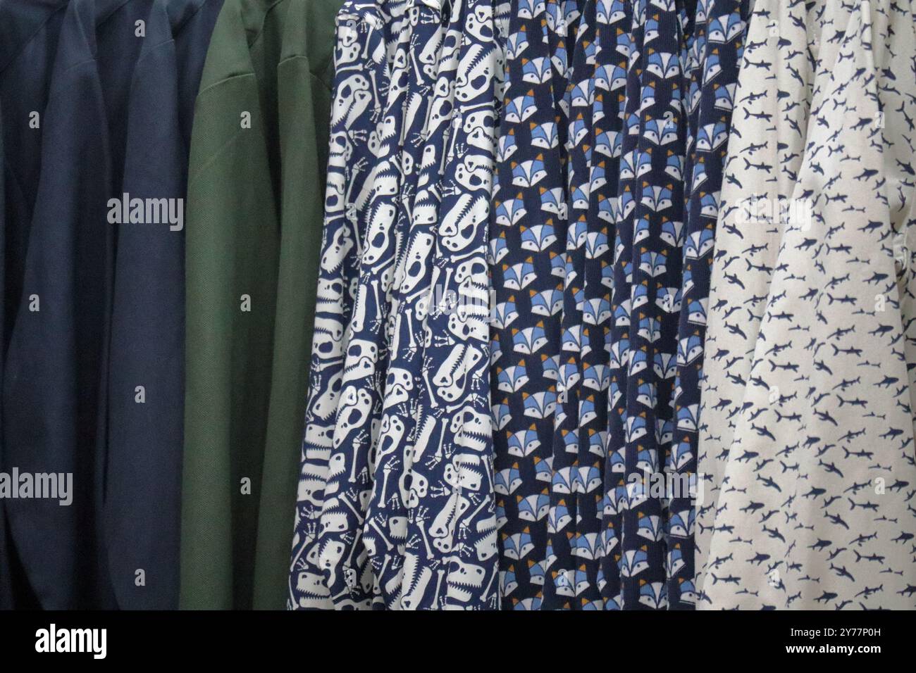 Colored tribal african shirts on rack Stock Photo - Alamy