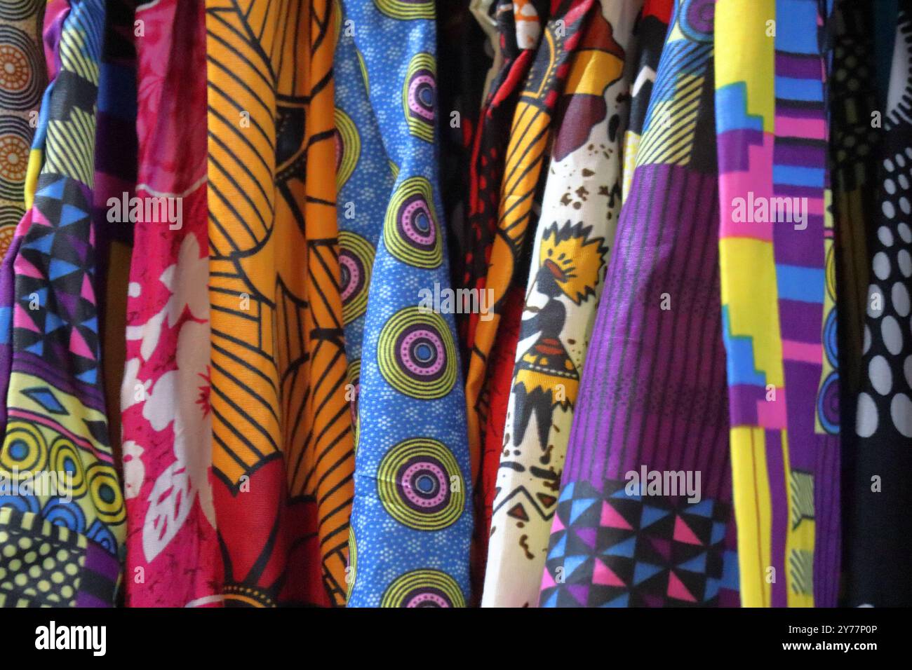 Colored tribal african shirts on rack Stock Photo - Alamy