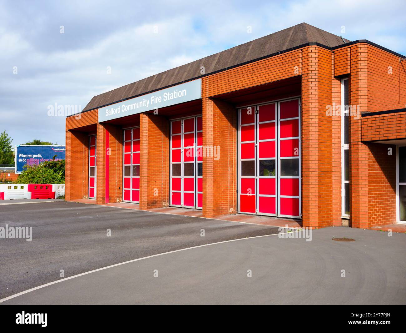 Salford, Manchester, UK. September, 28, 2024: Red-brick fire station ...