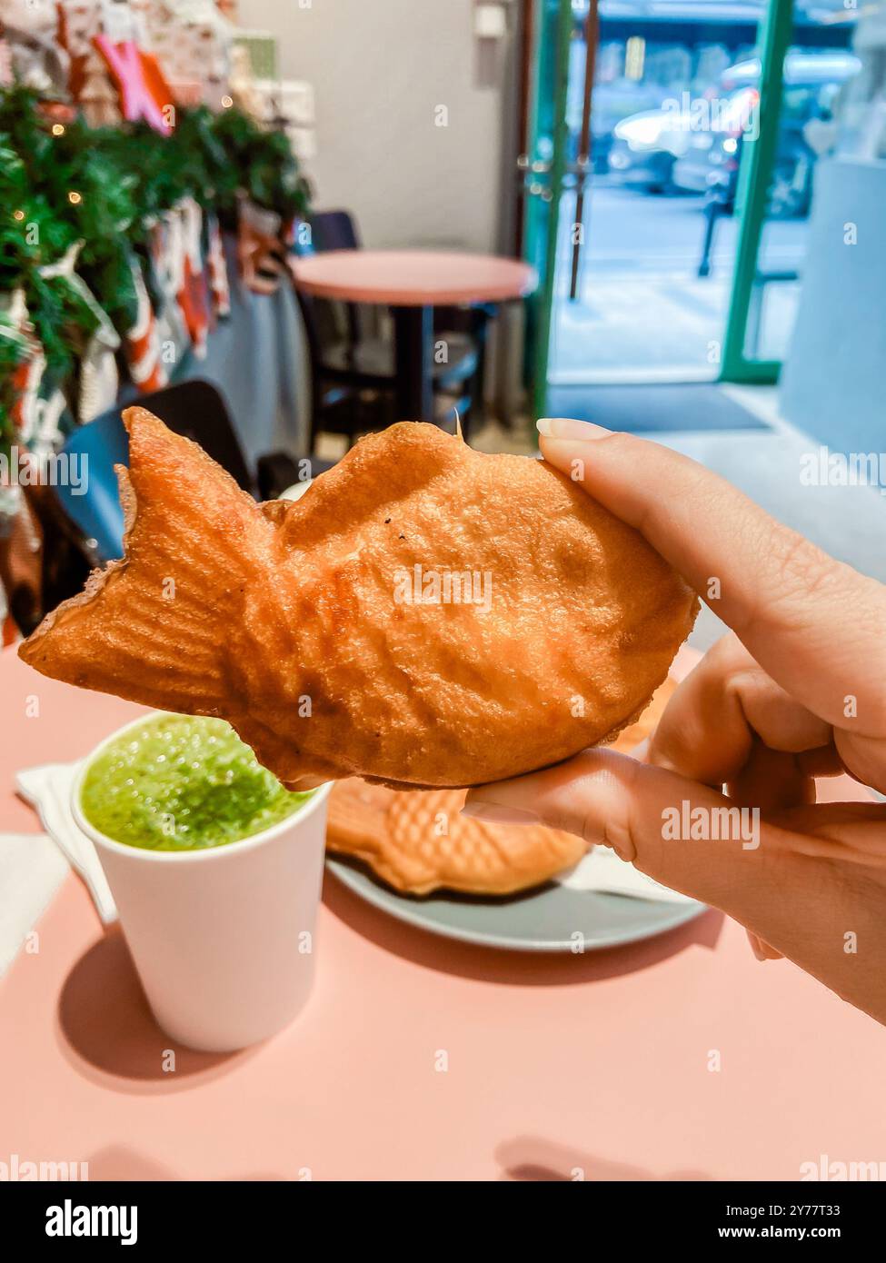 Japanese sweet taiyaki dessert. Freshly baked fish shaped waffle ...