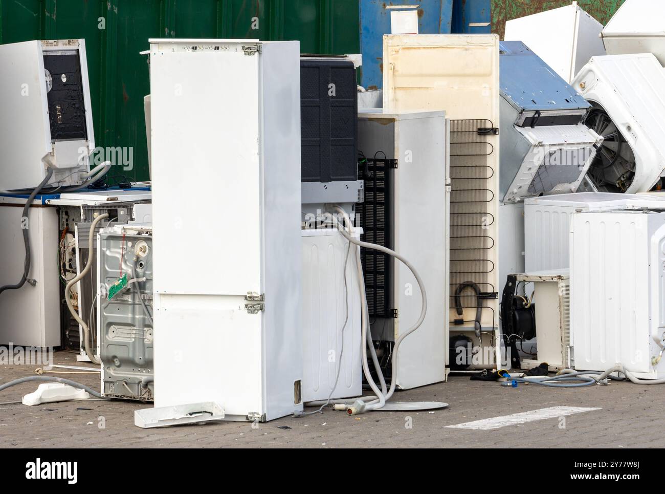 Old refrigerators and washing machines for e-waste disposal Stock Photo ...