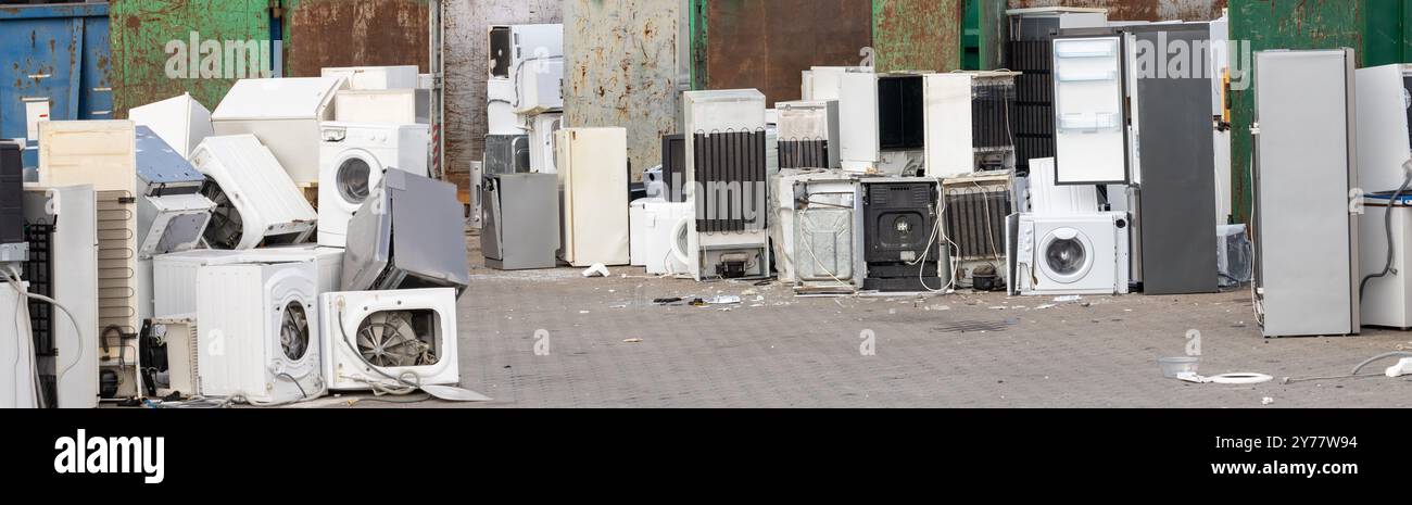 Discarded appliances in an e-waste disposal area Stock Photo - Alamy