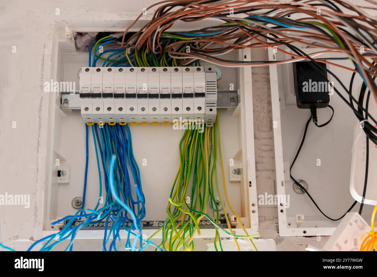 Electrical panel in the apartment on a white wall. Fuse box Stock Photo ...