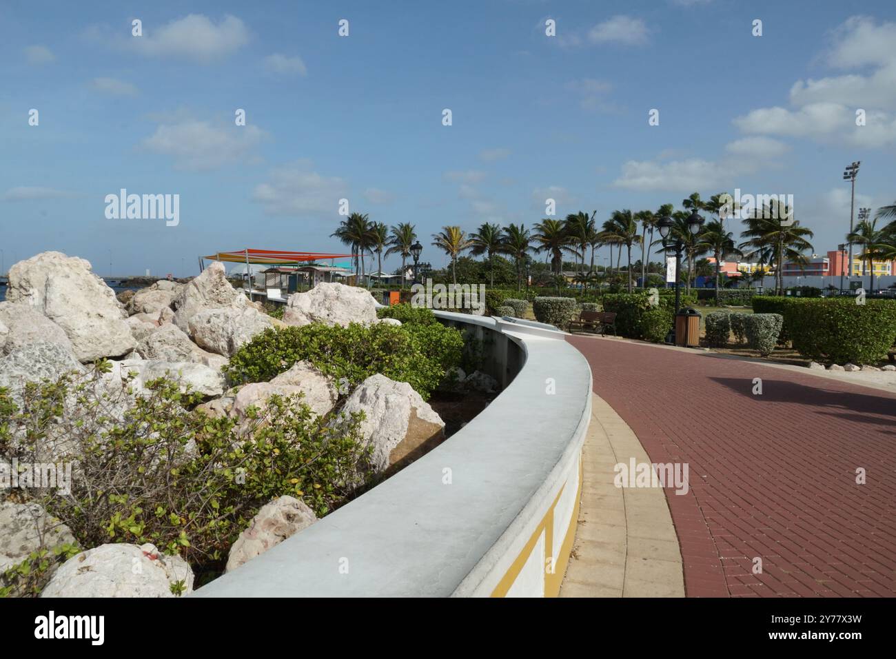 A modern promenade and vibrant hotels line the waterfront, welcoming ...