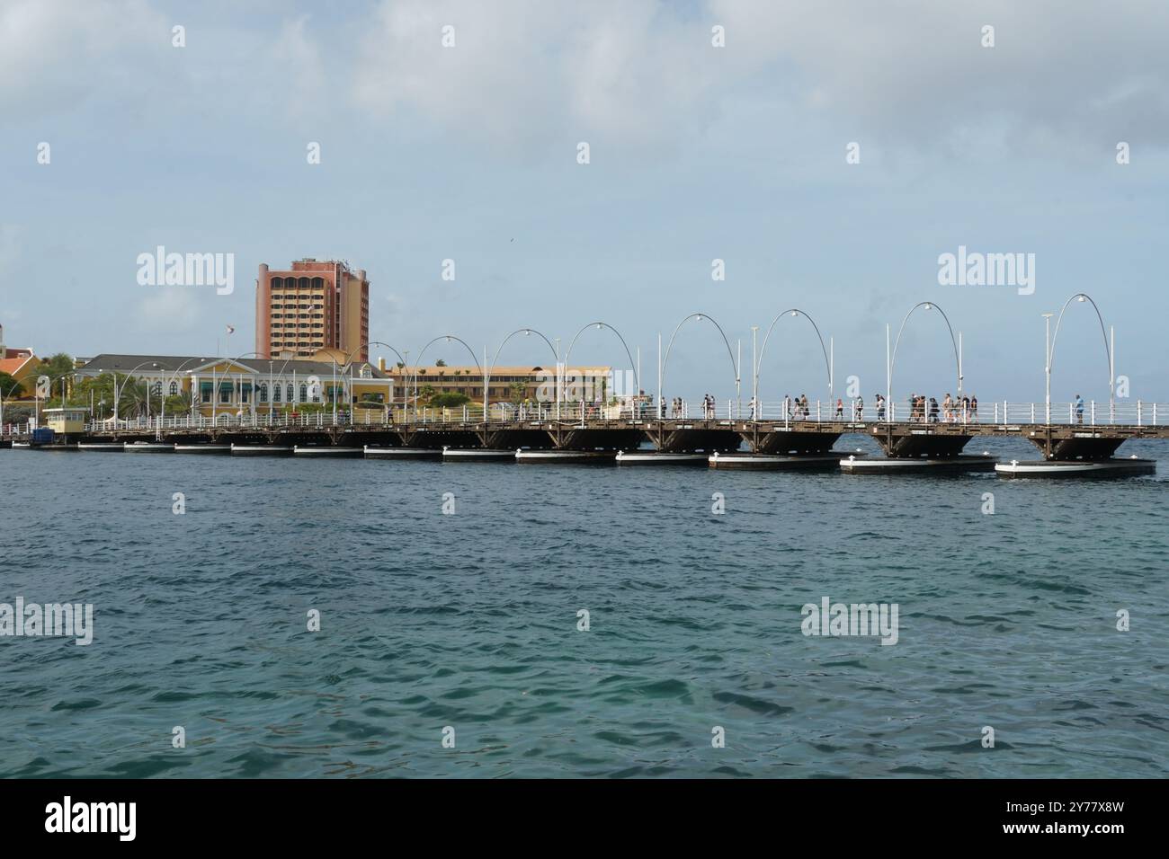 Queen Emma bridge is swing and pontoon bridge across St. Anna Bay ...
