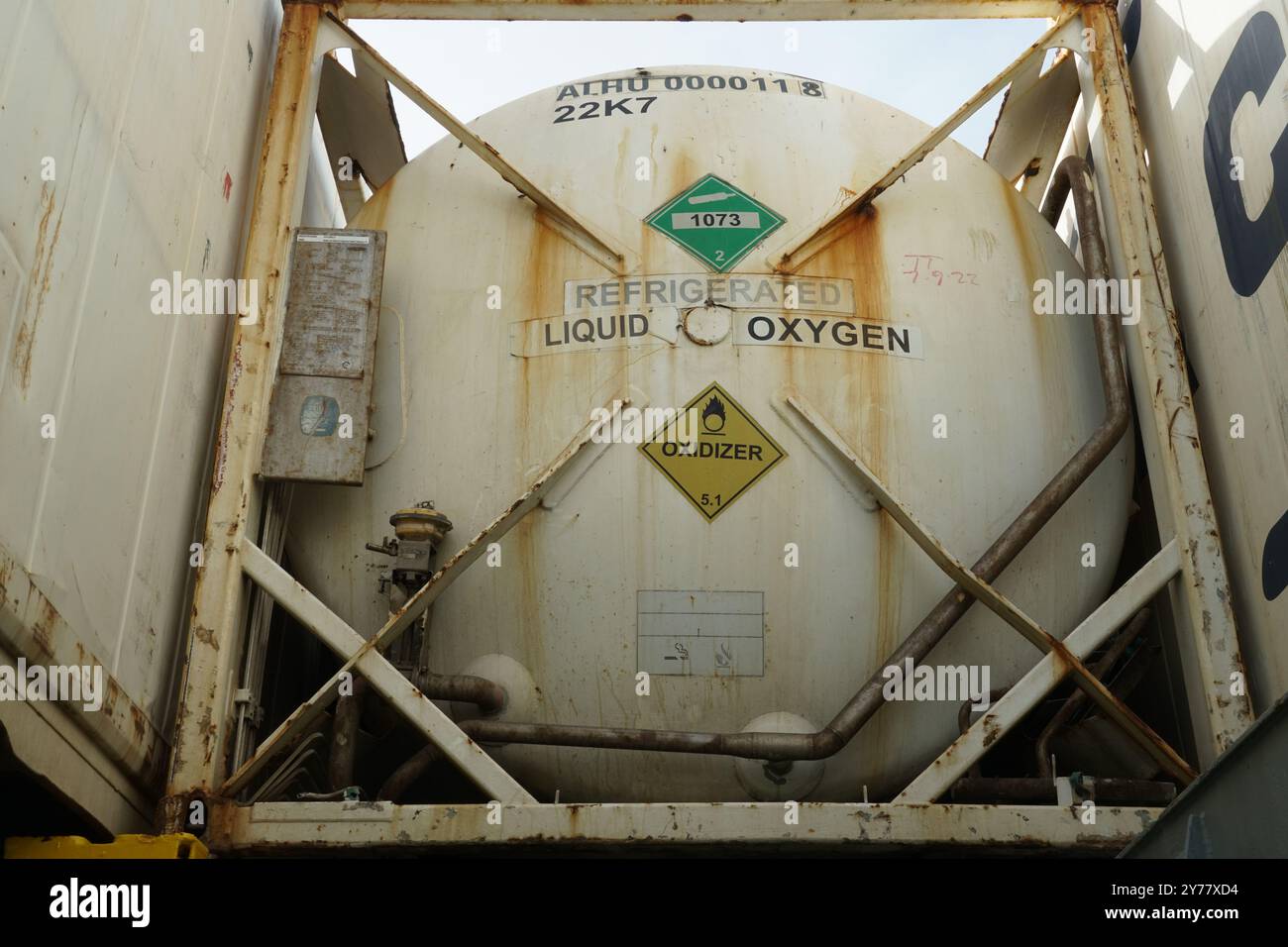 White container secured with bars and twist locks on deck of a ...