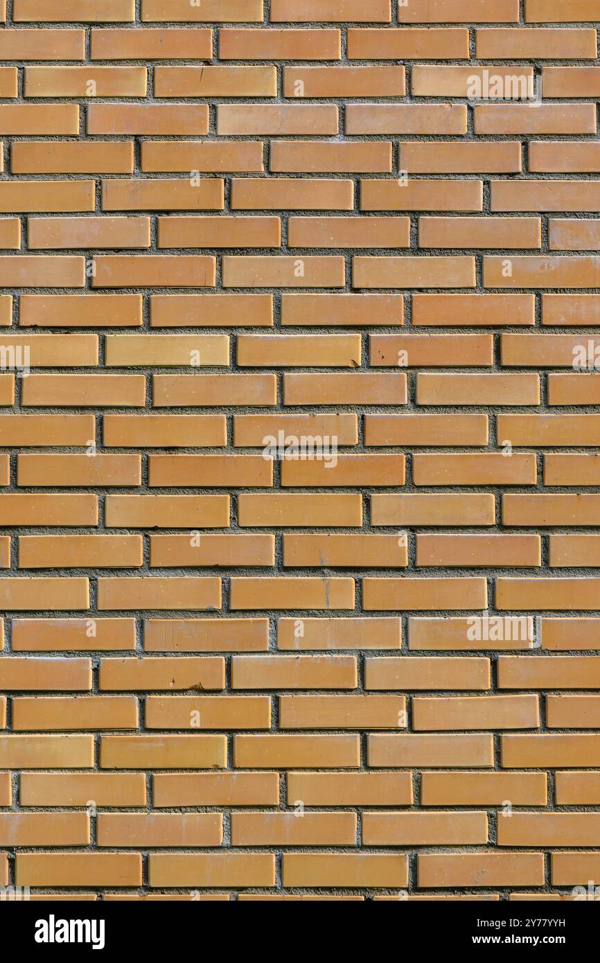 Yellow brick wall texture with messy mortar Stock Photo - Alamy