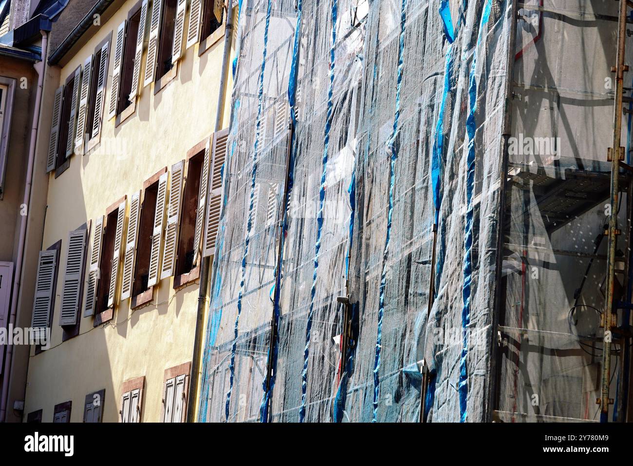 Tall old historical building in French city Colmar under construction ...
