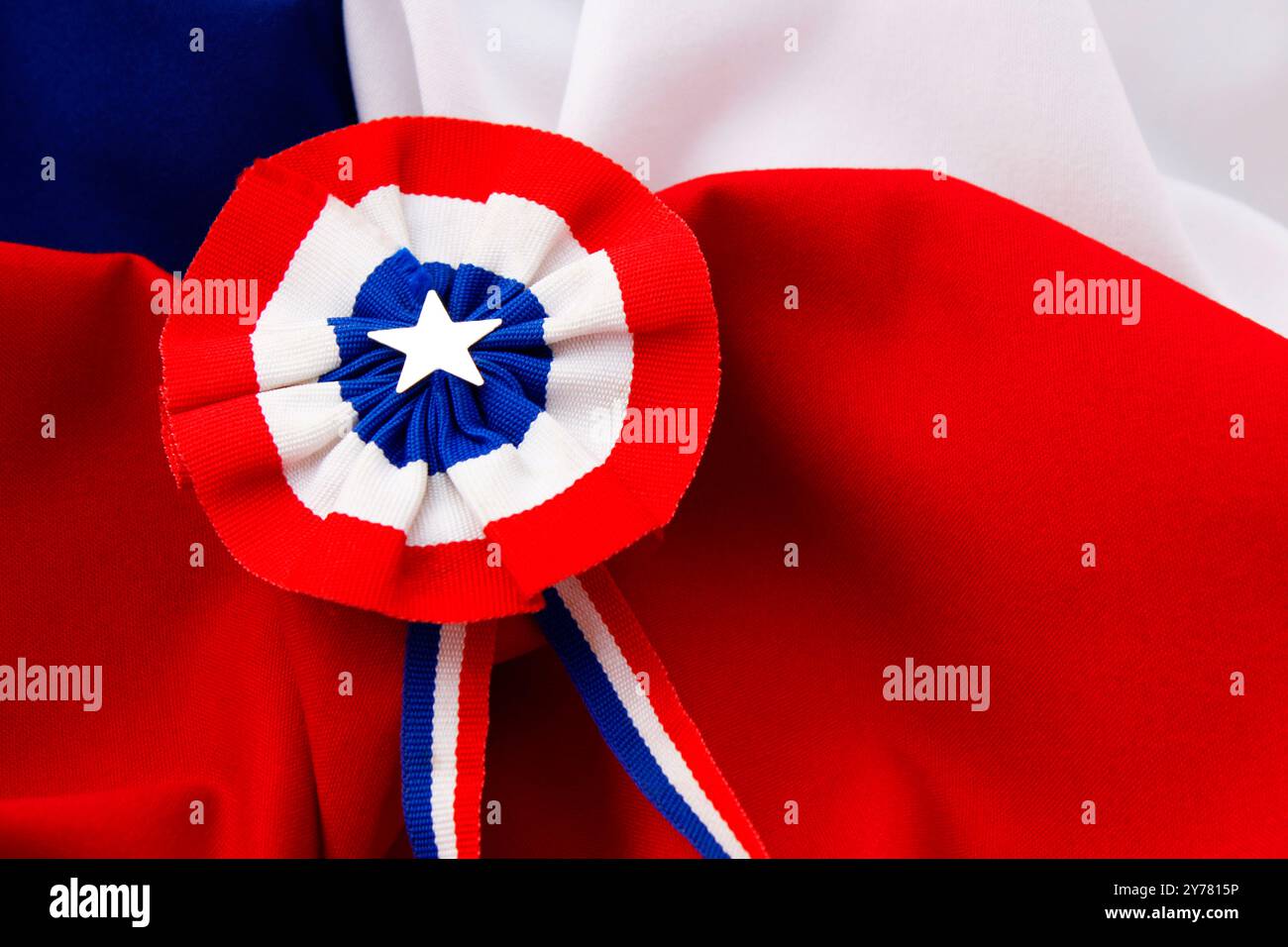Rosette with the colors of the chilean flag Stock Photo - Alamy