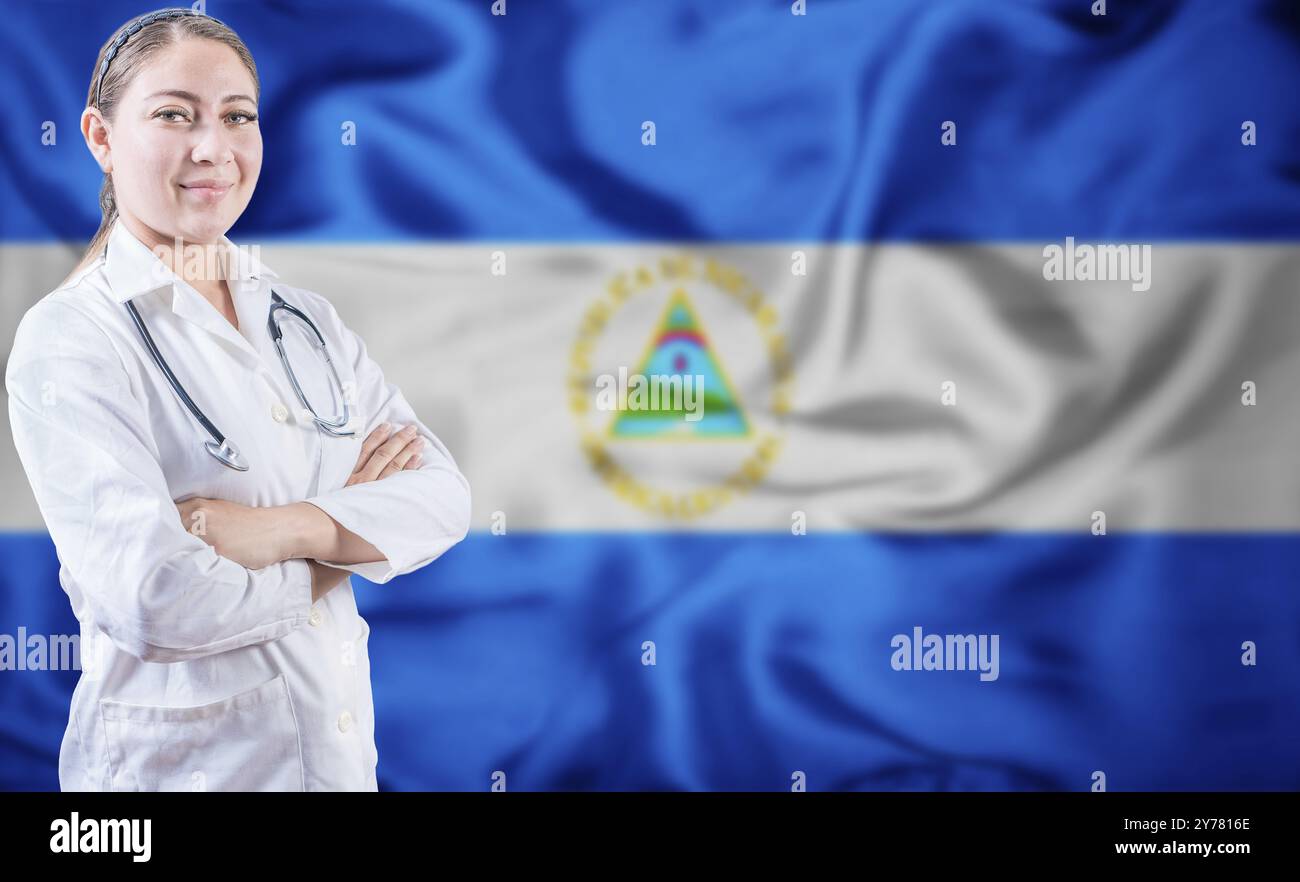 Doctor with crossed arms on Nicaragua flag background. Doctor with ...