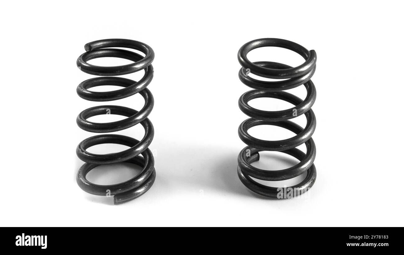 2 car springs on a white background. Isolated spare parts for vehicle ...