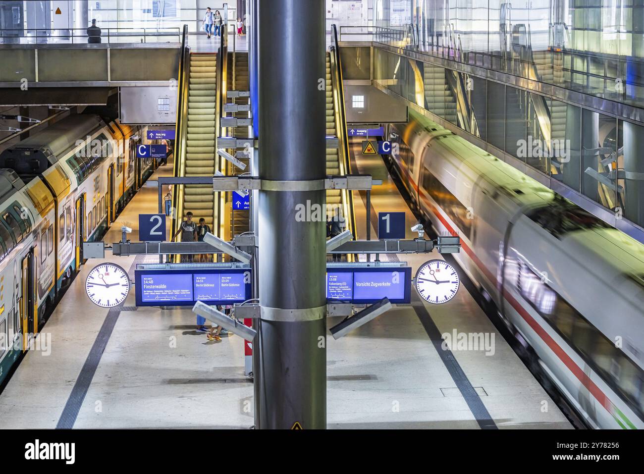 Platform at Gesundbrunnen station with an ICE train passing through: Caution train traffic sign ...