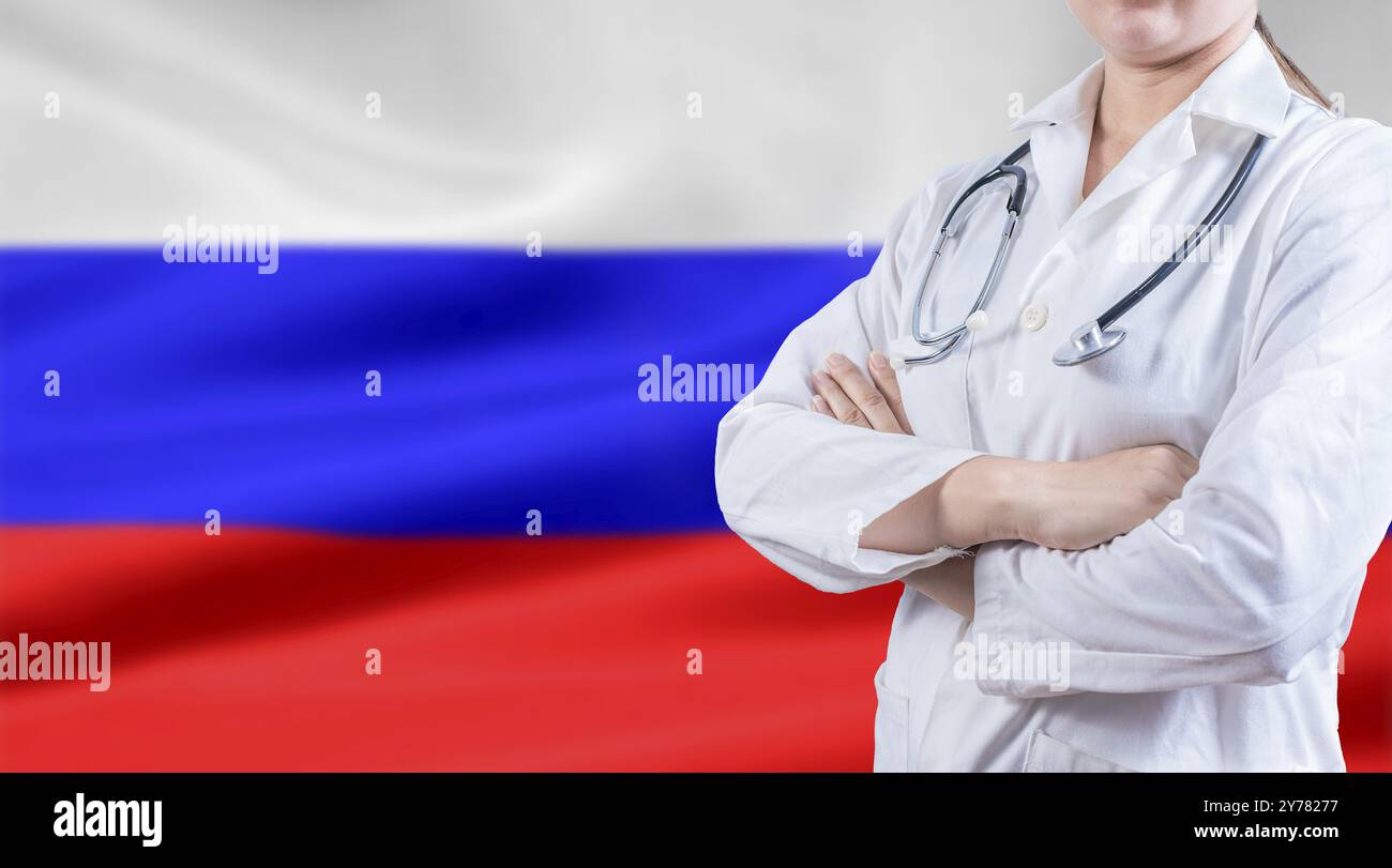 Doctor with stethoscope on Russian flag. Russian health and care ...