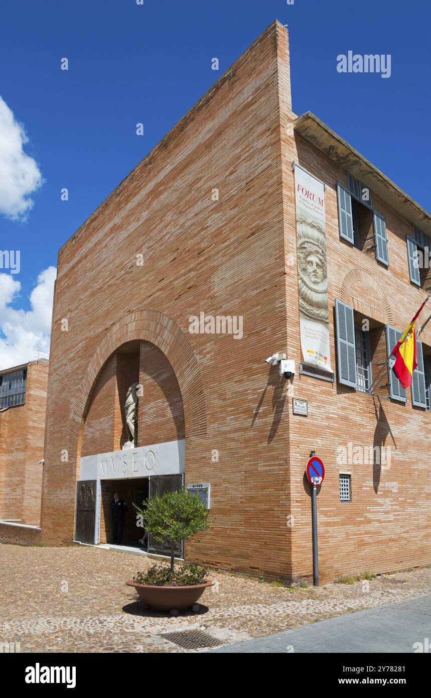 Modern museum building made of red bricks with blue shutters and the ...