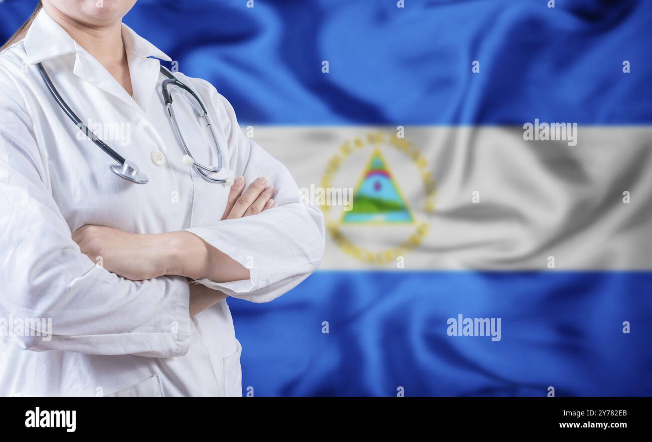 Doctor with stethoscope on Nicaraguan flag. Nicaragua Health and Care ...