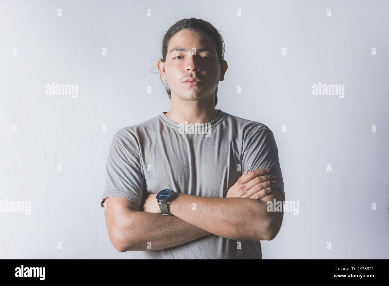 Handsome young guy arms hi-res stock photography and images - Alamy