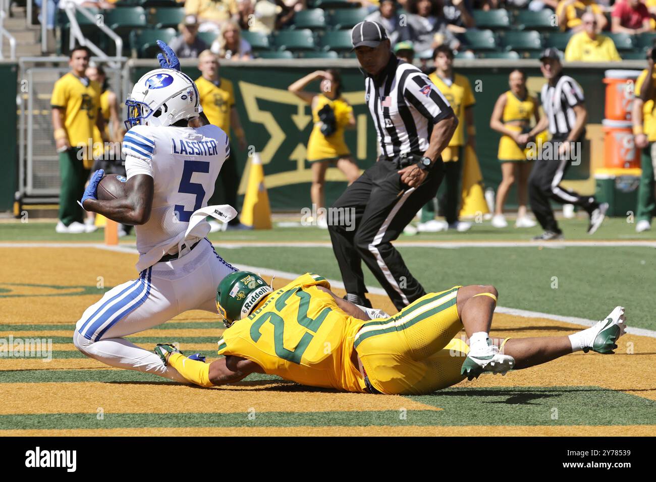 Brigham Young wide receiver Darius Lassiter catches a pass for a ...