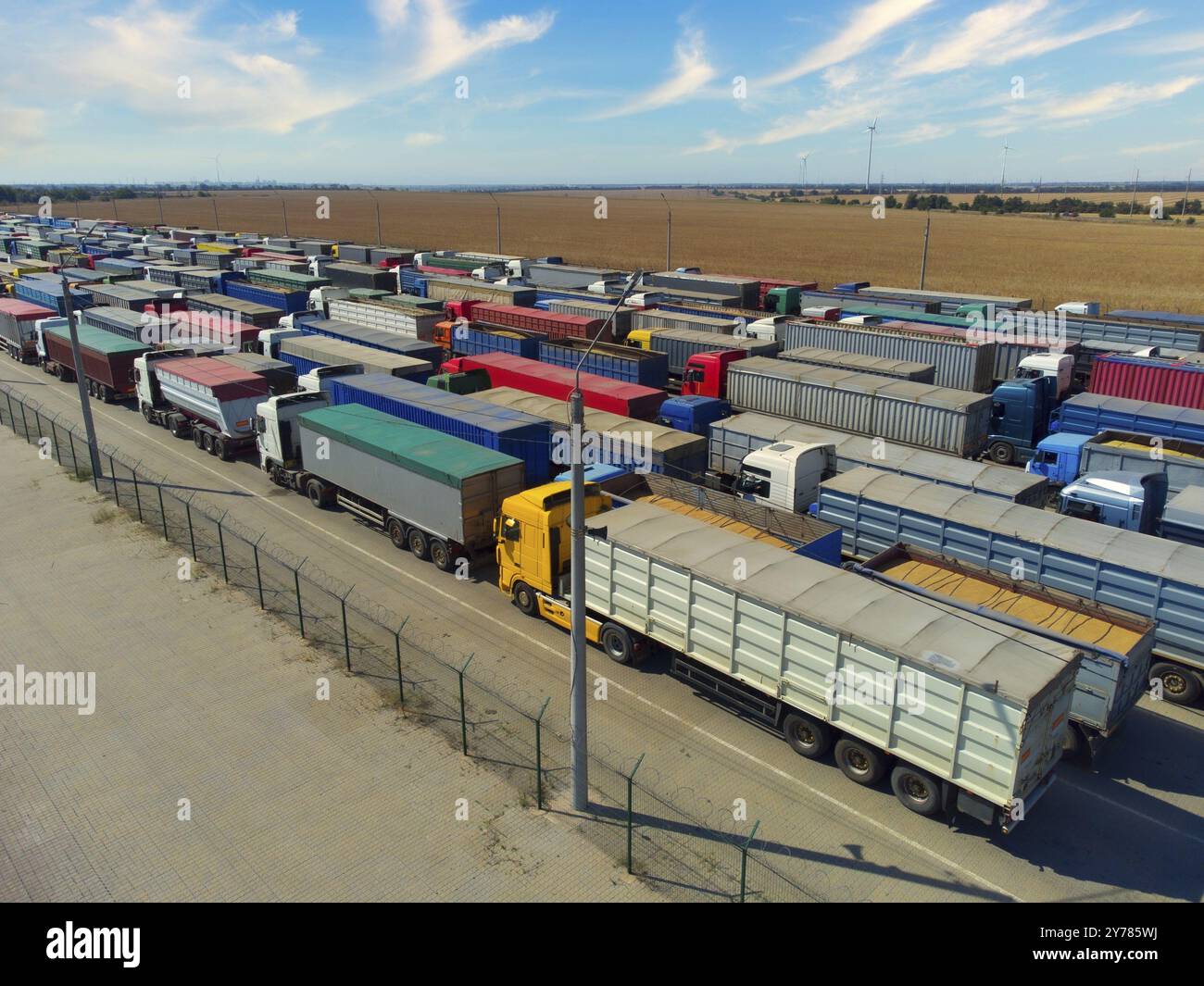 Aerial view of trucks. Terminal in the port for unloading trucks with ...