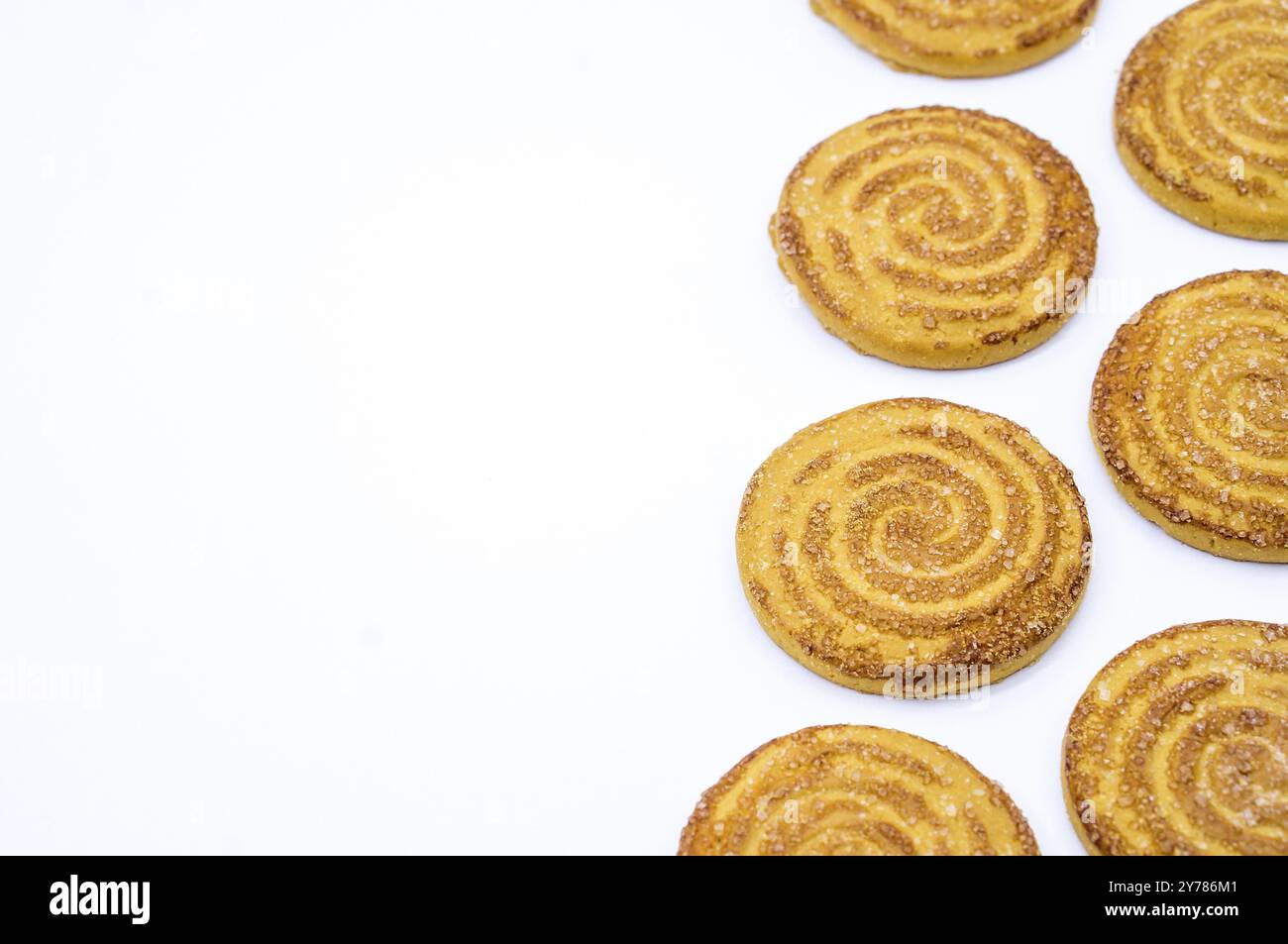 Curled cookies with sugar. Round cookies sprinkled with sugar Stock ...