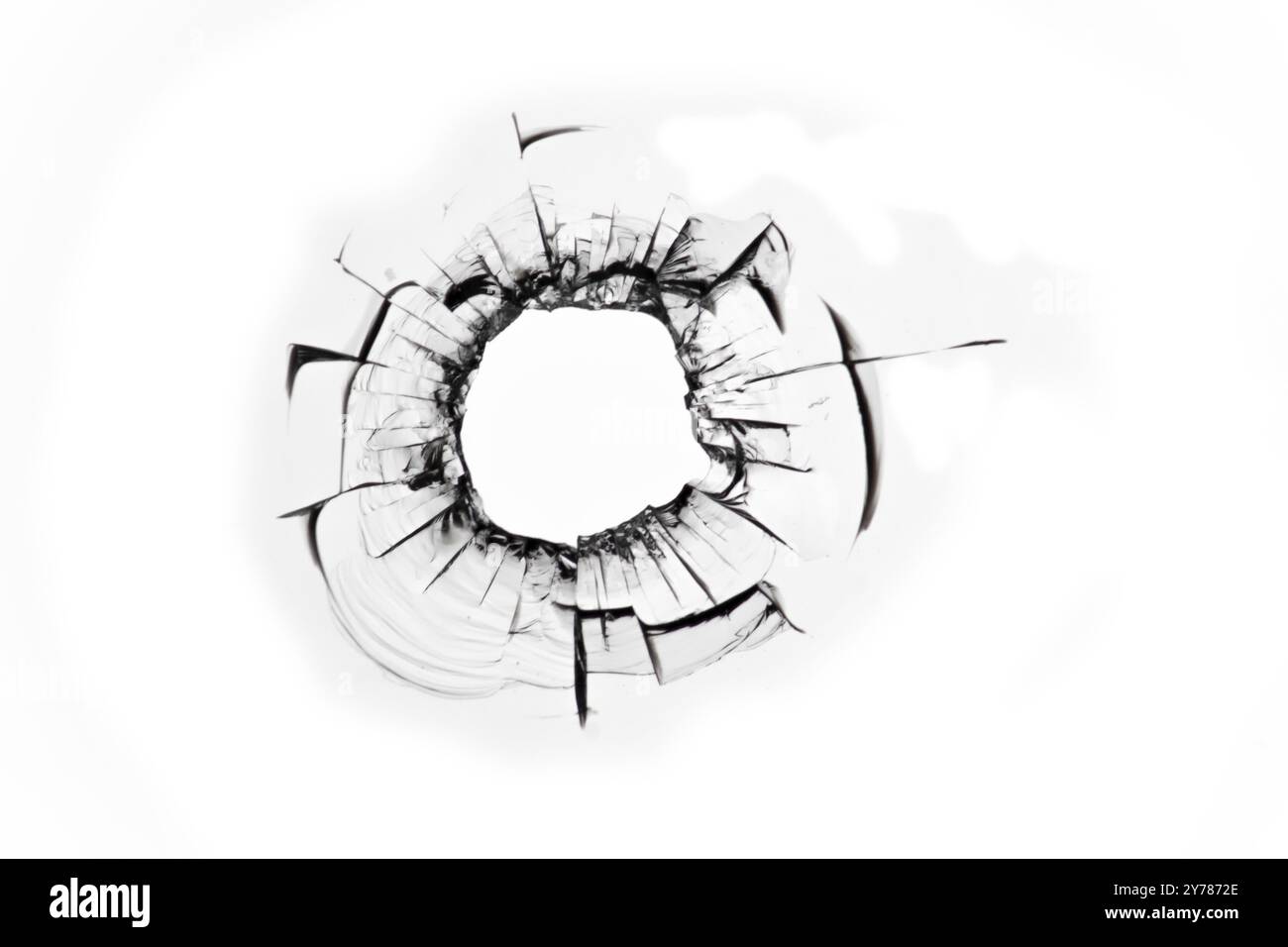 Shot hole, broken glass, cracked window, abstraction of cracked broken ...