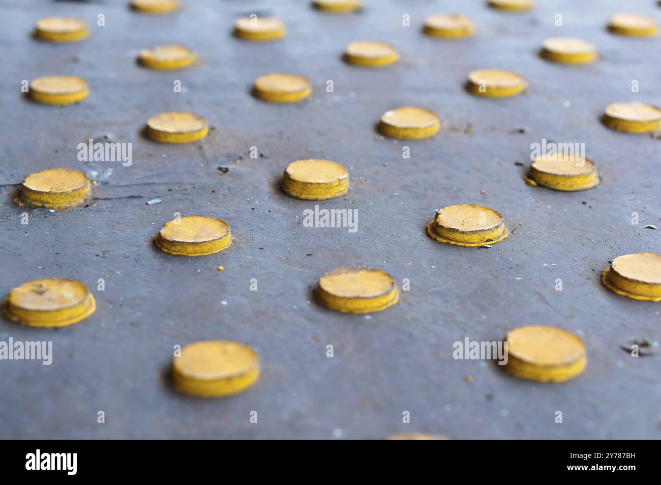 Background yellow pimples, round metal yellow projections Stock Photo ...