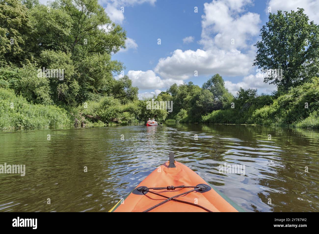 Journey in kayaks on the river. Active rest on the water. Canoeing on a ...