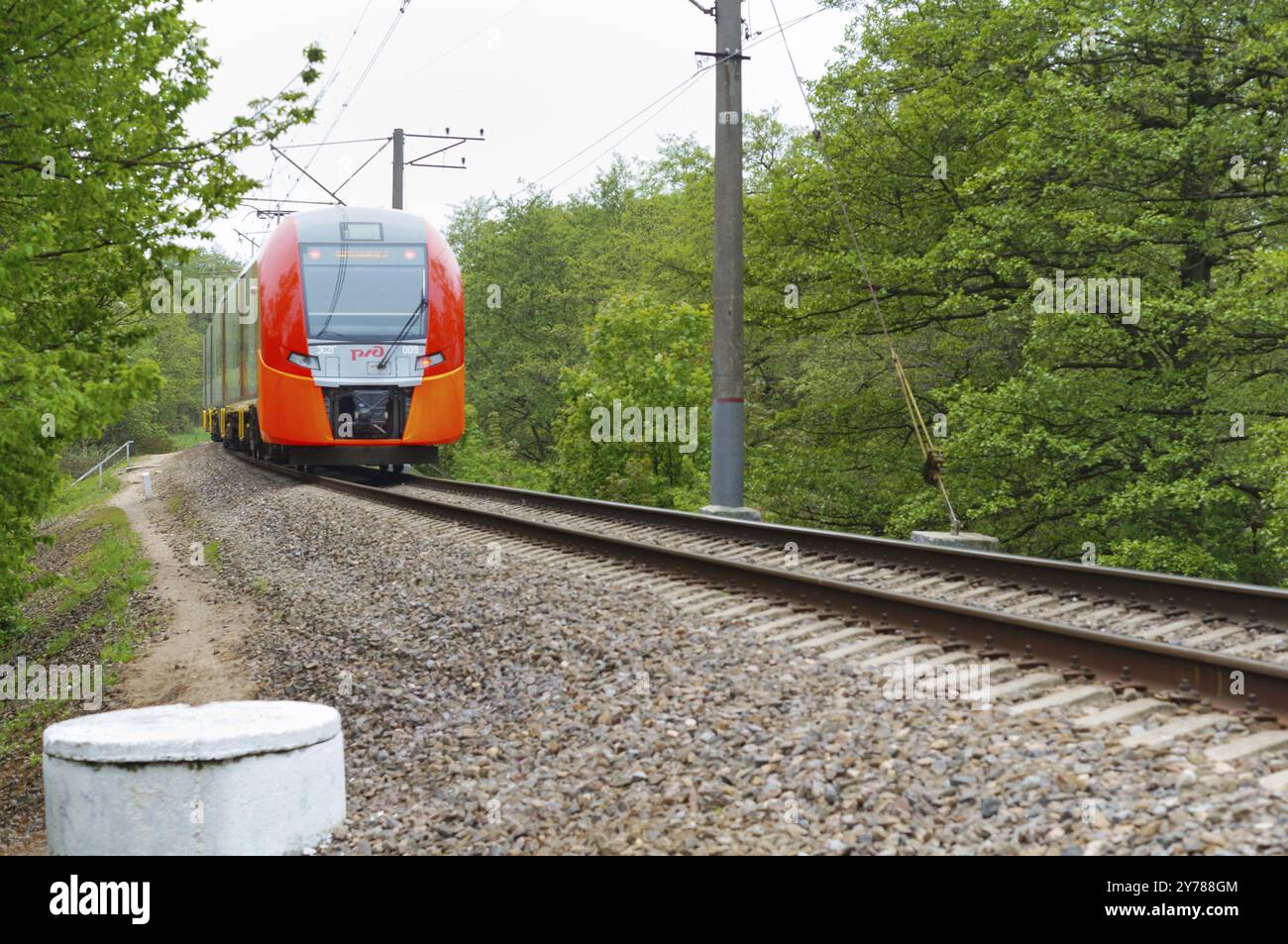 The train is in the distance, the train on the railway tracks, Russian ...