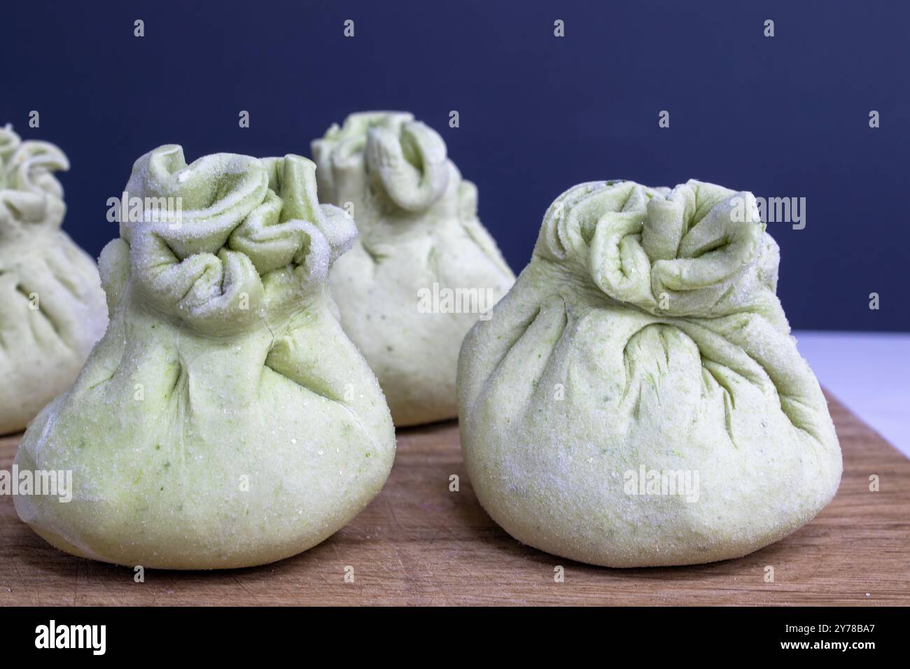 Frozen, green khinkali. Delicious Georgian khinkali. Copy space for ...