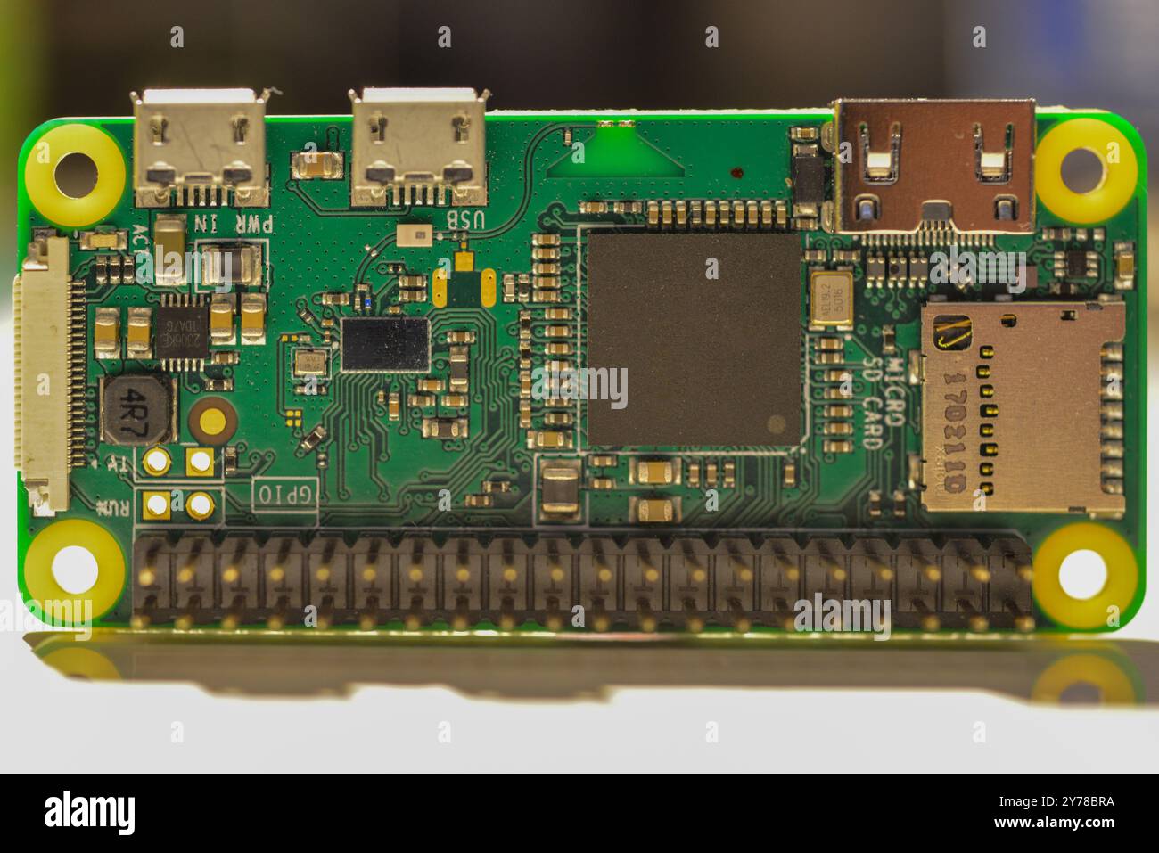 A backlit macro close-up of a Raspberry Pi Zero Wireless circuit board ...