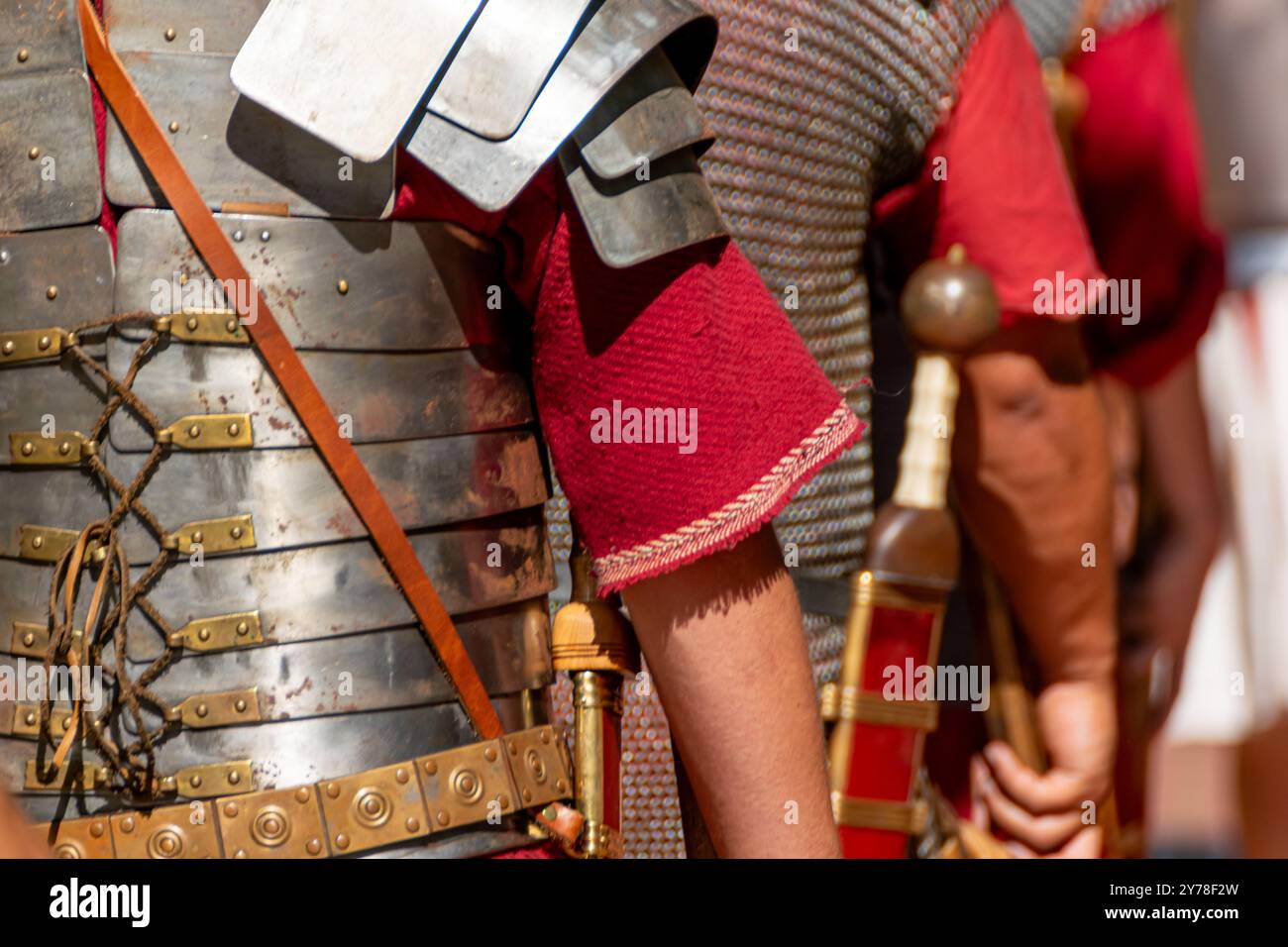 detail of an ancient roman soldiers, roman legionnaires in metal armor ...