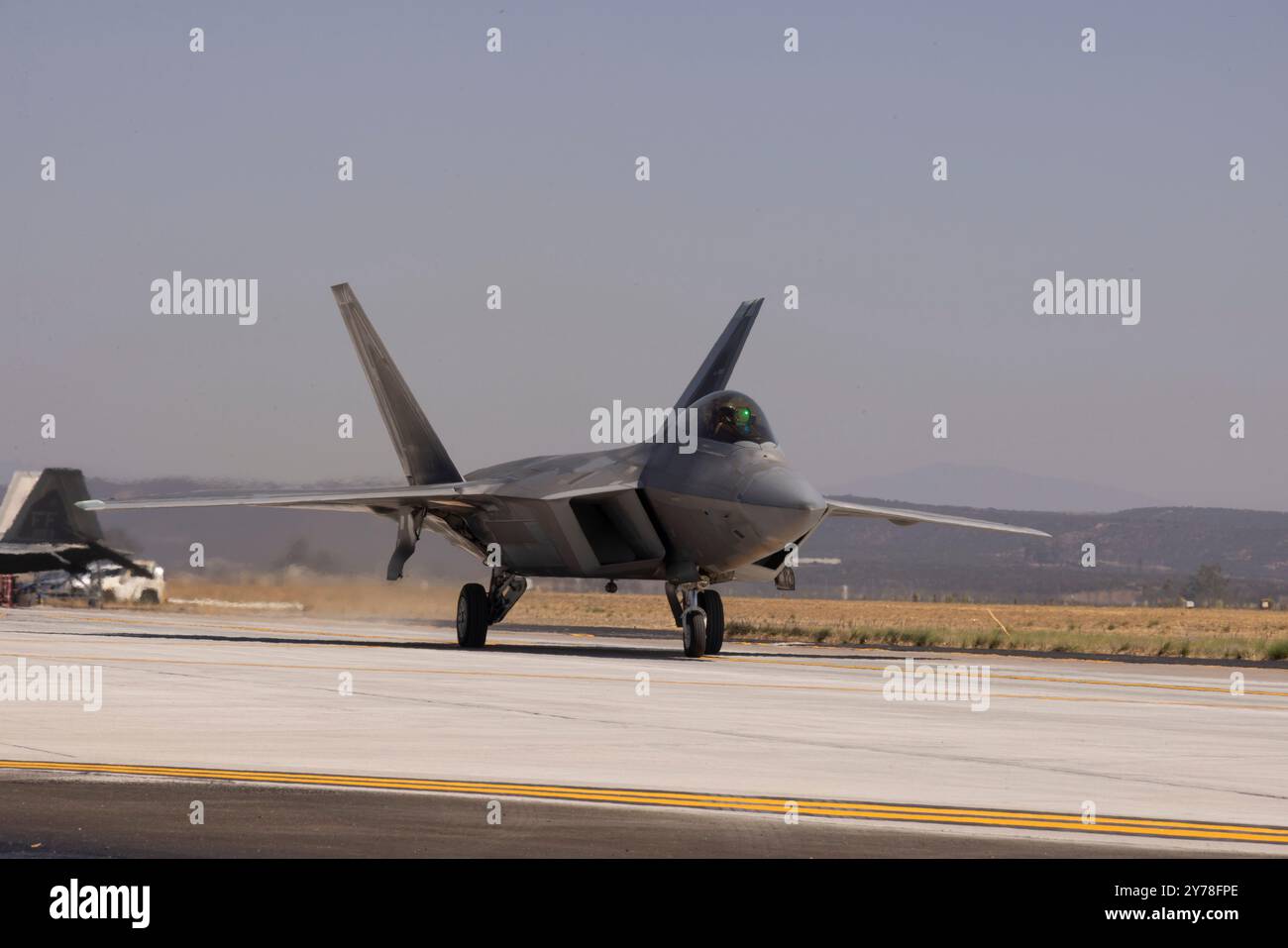 A U.S. Air Force F-22 Raptor Demo Team pilot taxies during the 2024 ...