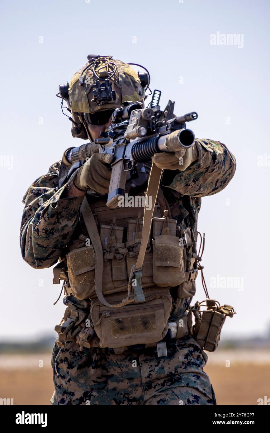 A U.S. Marine with 3rd Battalion, 5th Marine Regiment, 1st Marine Division, provides security ...