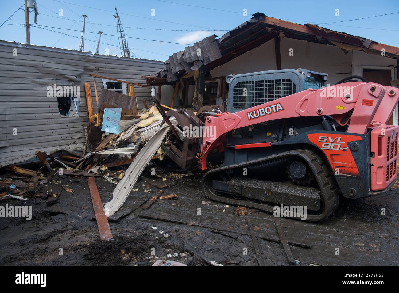 U.S. Airmen assigned to the 202nd Rapid Engineer Deployable Heavy ...